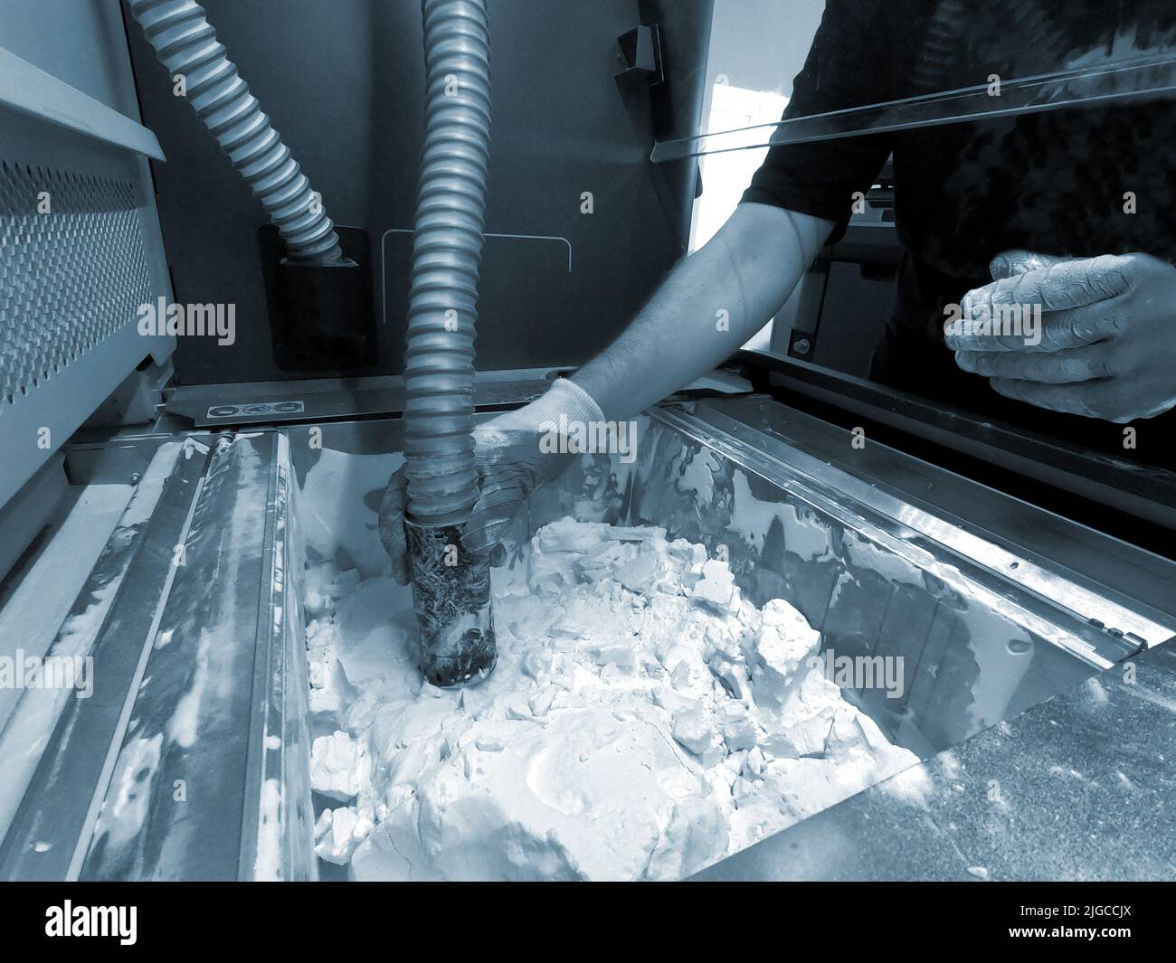 Engineer or artist designer printing 3D parts and shaping models from ...