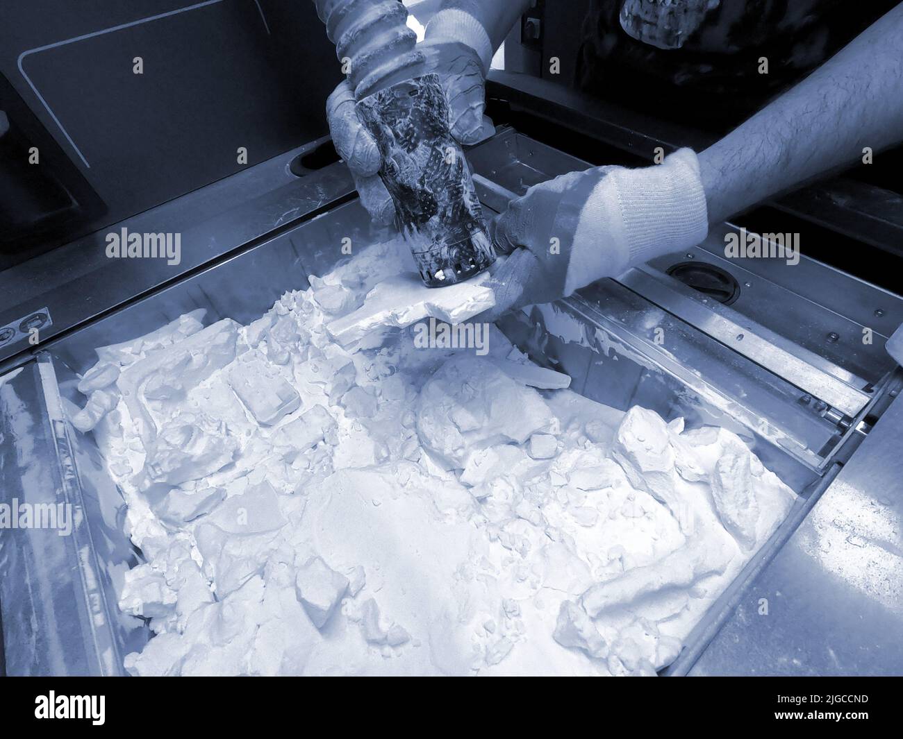 Engineer or artist designer printing 3D parts and shaping models from ...