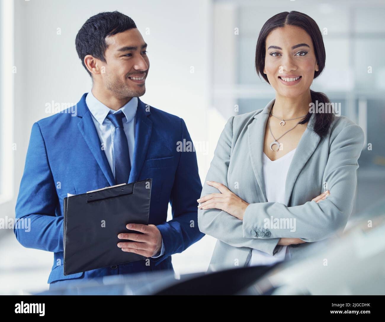 Hes the best salesman in town. a handsome young male car salesman ...