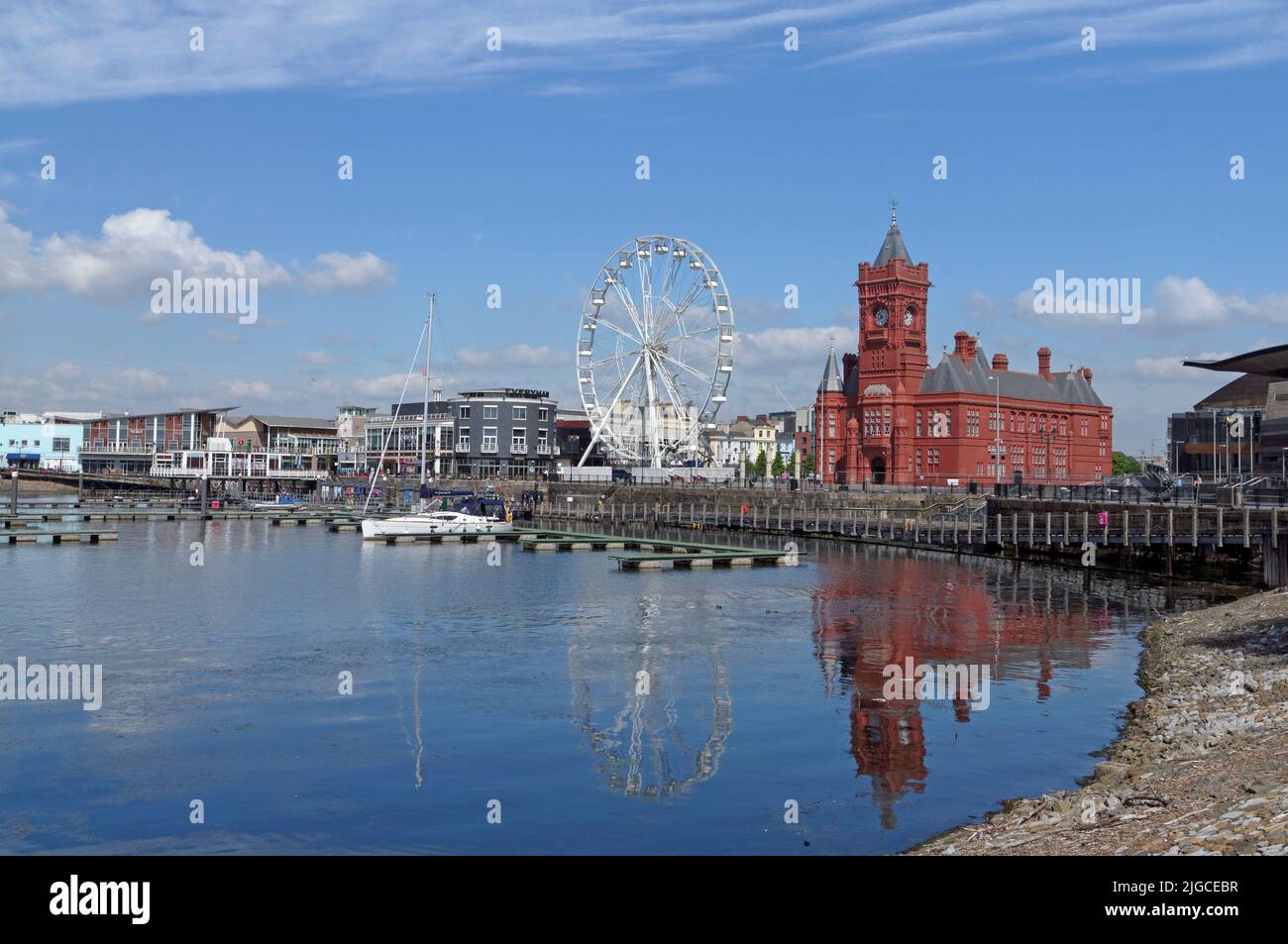 Cardiff Bay view showing Pierhead Building and Ferris wheel. Summer ...