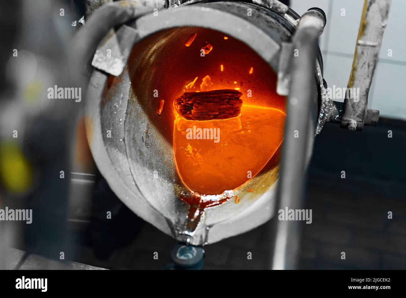 Hot red liquid silver metal in bucket in melting furnace Stock Photo ...