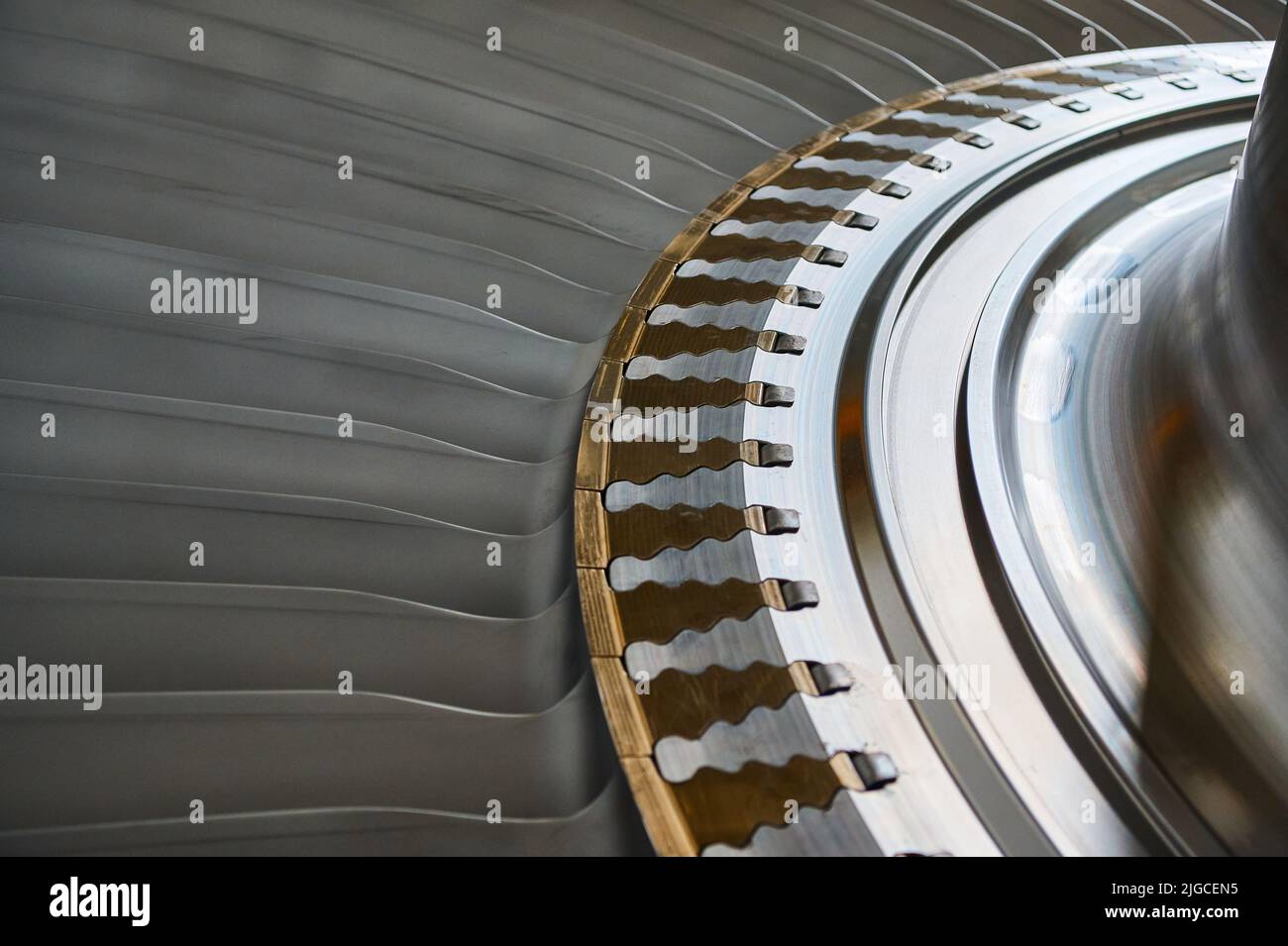 The rotor blades of a modern turbine, a close-up shot of the roots of ...