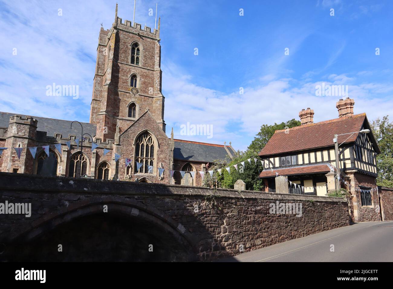 The priory church of Saint George and the Priest's House both in the ...