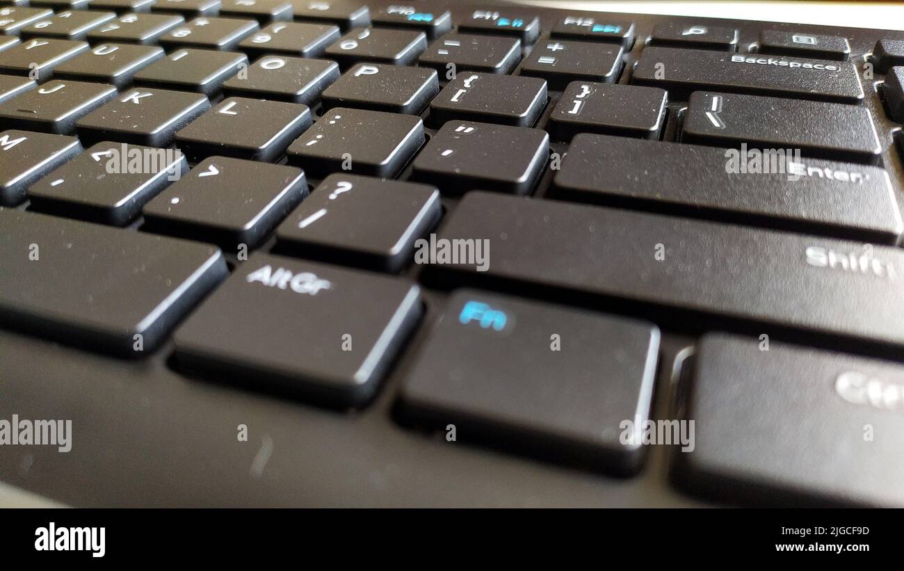 realistic black keyboard with blue accent color enter key and led lock ...