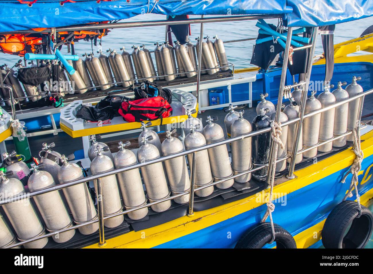 Divers oxygen tanks on a deck of an excursion ship Stock Photo - Alamy