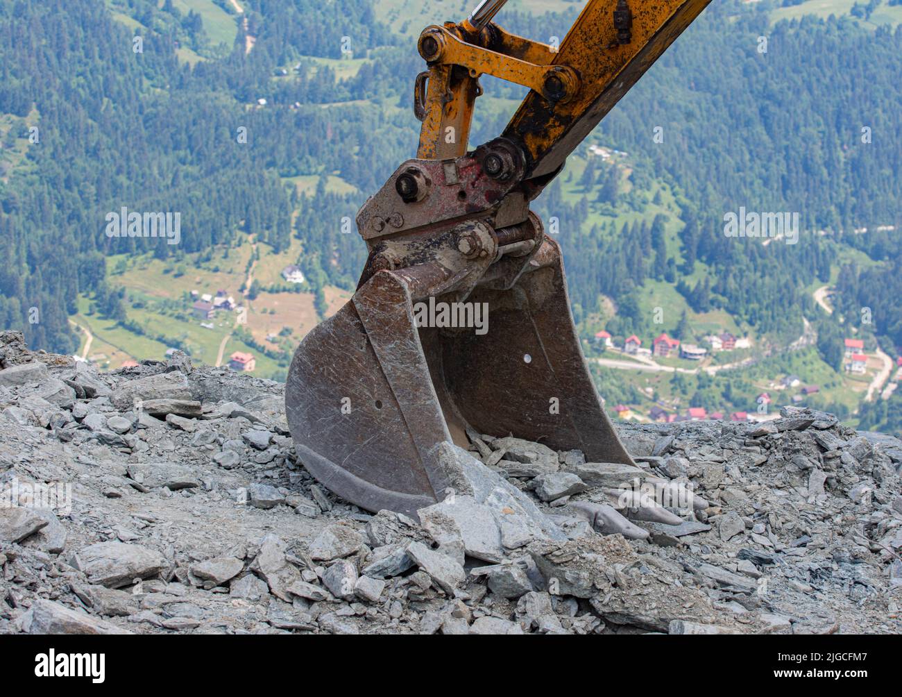 Heavy road construction elevator machine. Excavator shovel at ...