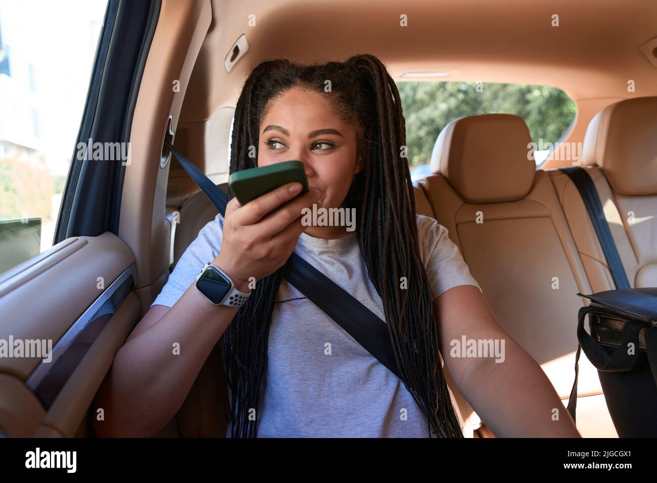 Woman speak phone in car hi-res stock photography and images - Alamy