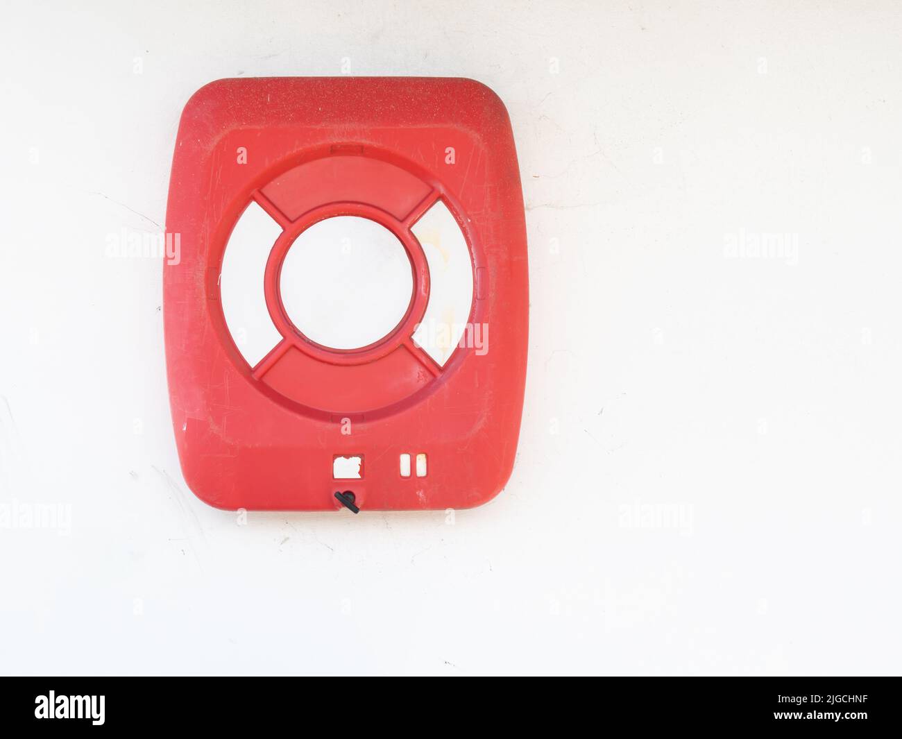 Bright red modern lifebuoy on wall Stock Photo - Alamy