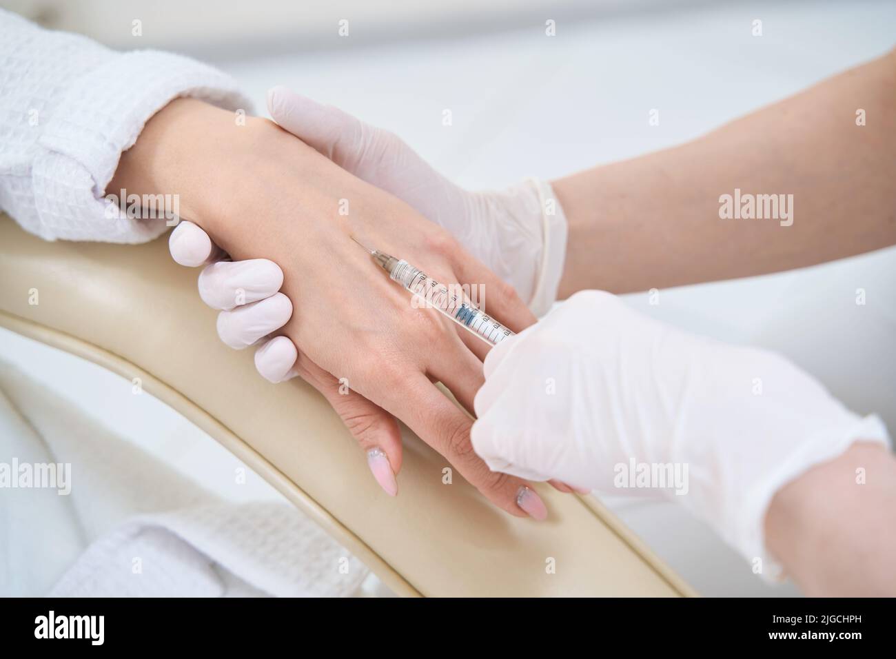 Wrist injection hi-res stock photography and images - Alamy