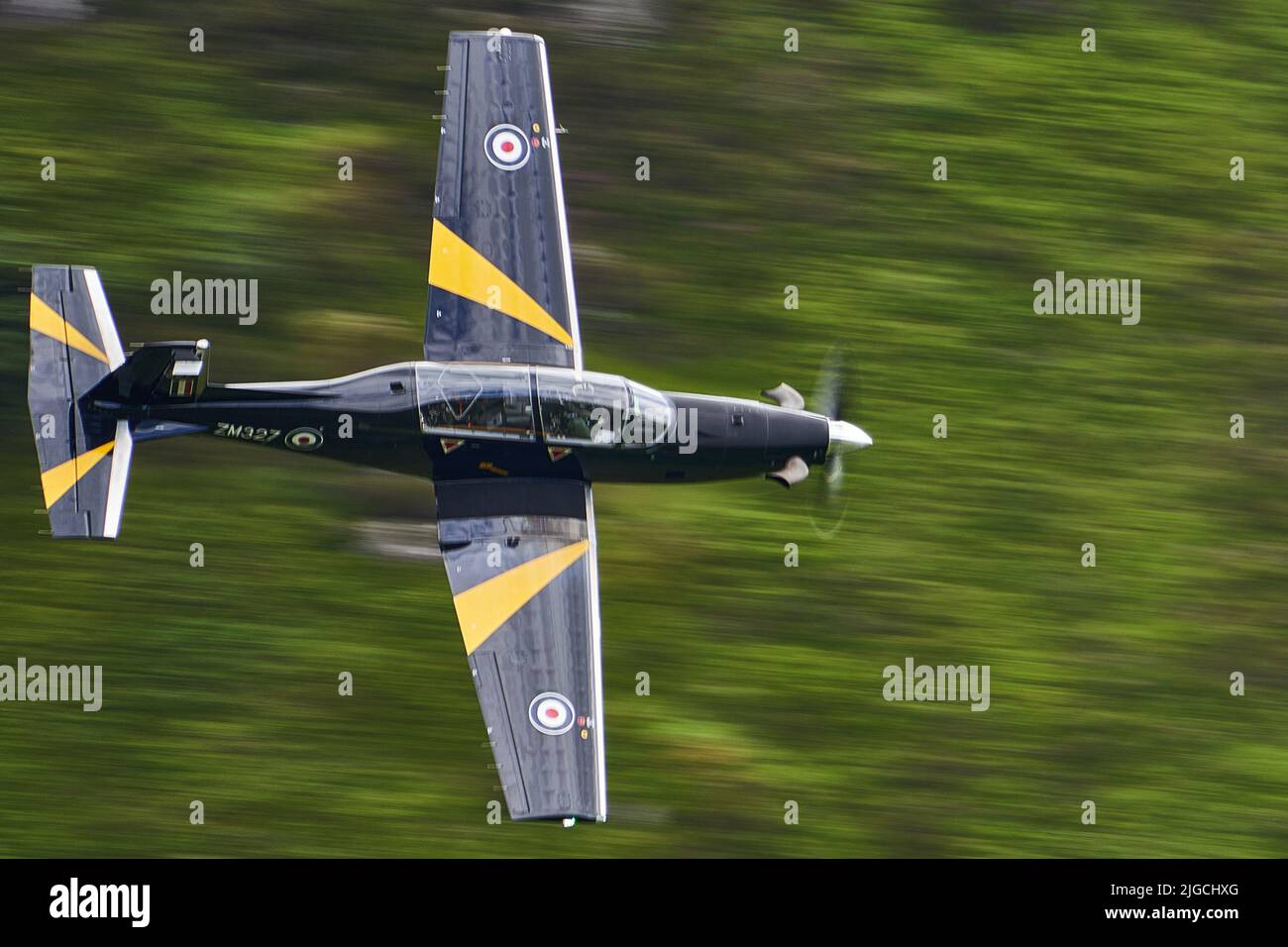 An aerial view of ZM327 Texan aircraft flying through the Mach Loop in ...
