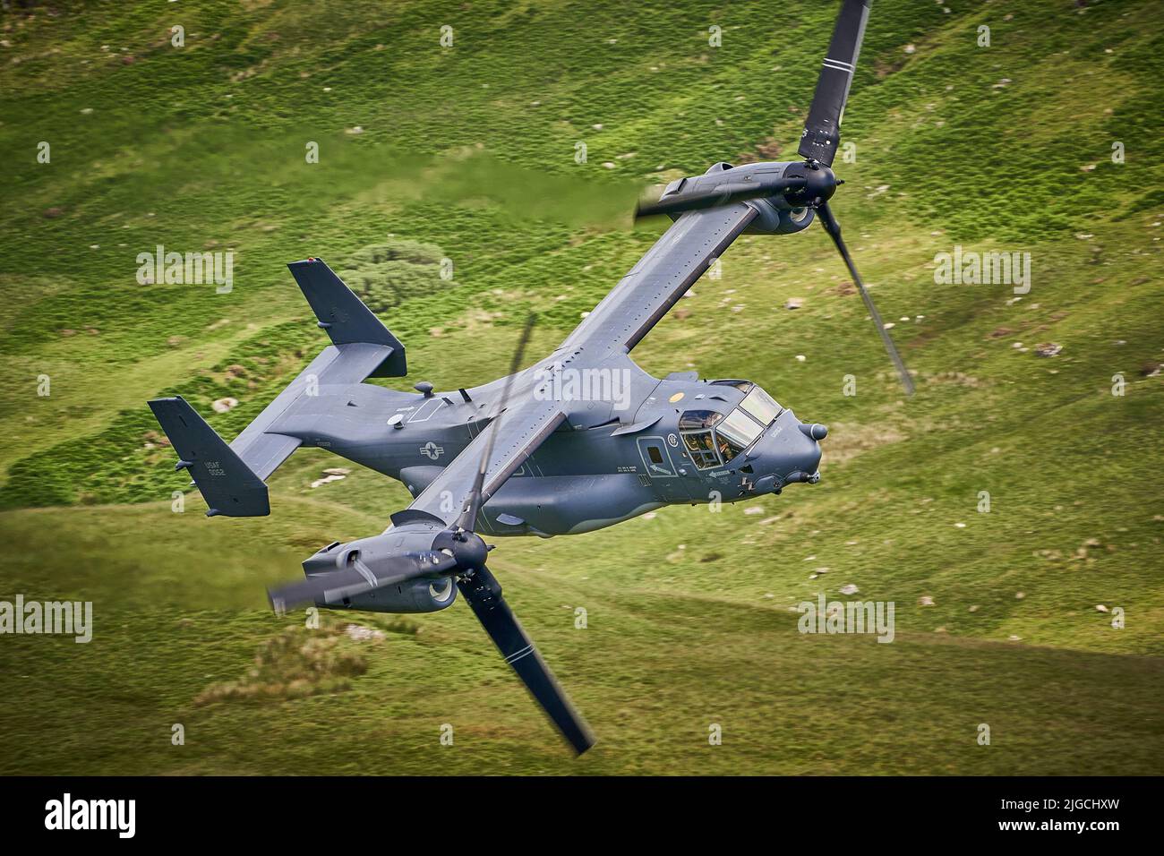 An aerial view of the V-22 Osprey aircraft flying through the Mach Loop ...