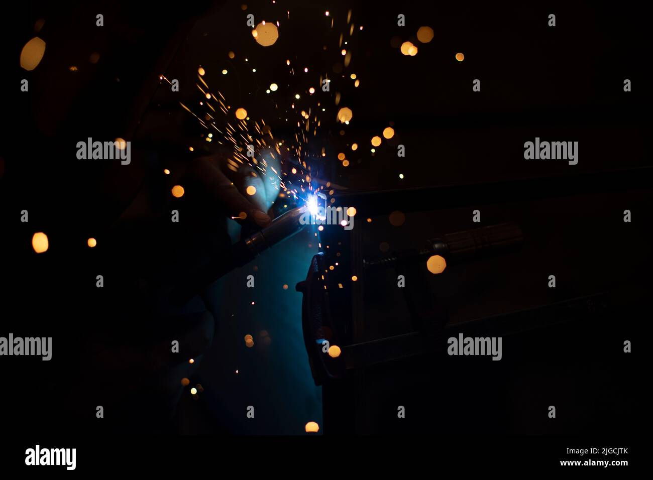 Welding work. High temperature. Hot steel. Metal welding. Production ...