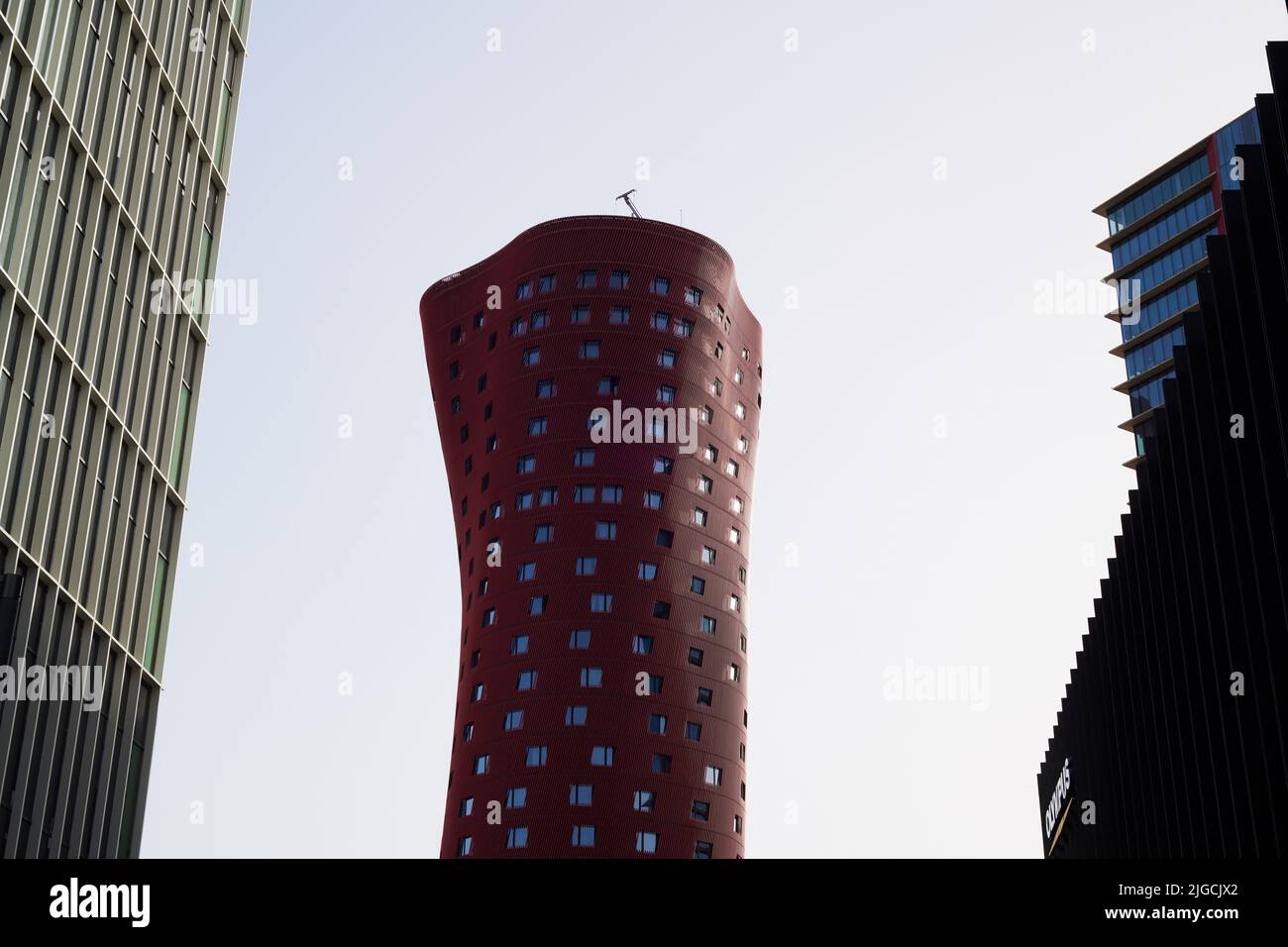 Odd shaped brown sausage building in the city of Barcelona Stock Photo ...