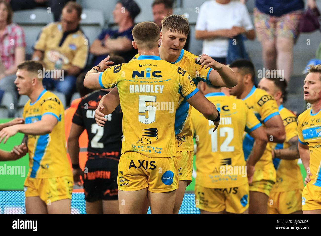 Ash Handley #5 of Leeds Rhinos and Sam Walters #22 of Leeds Rhinos ...