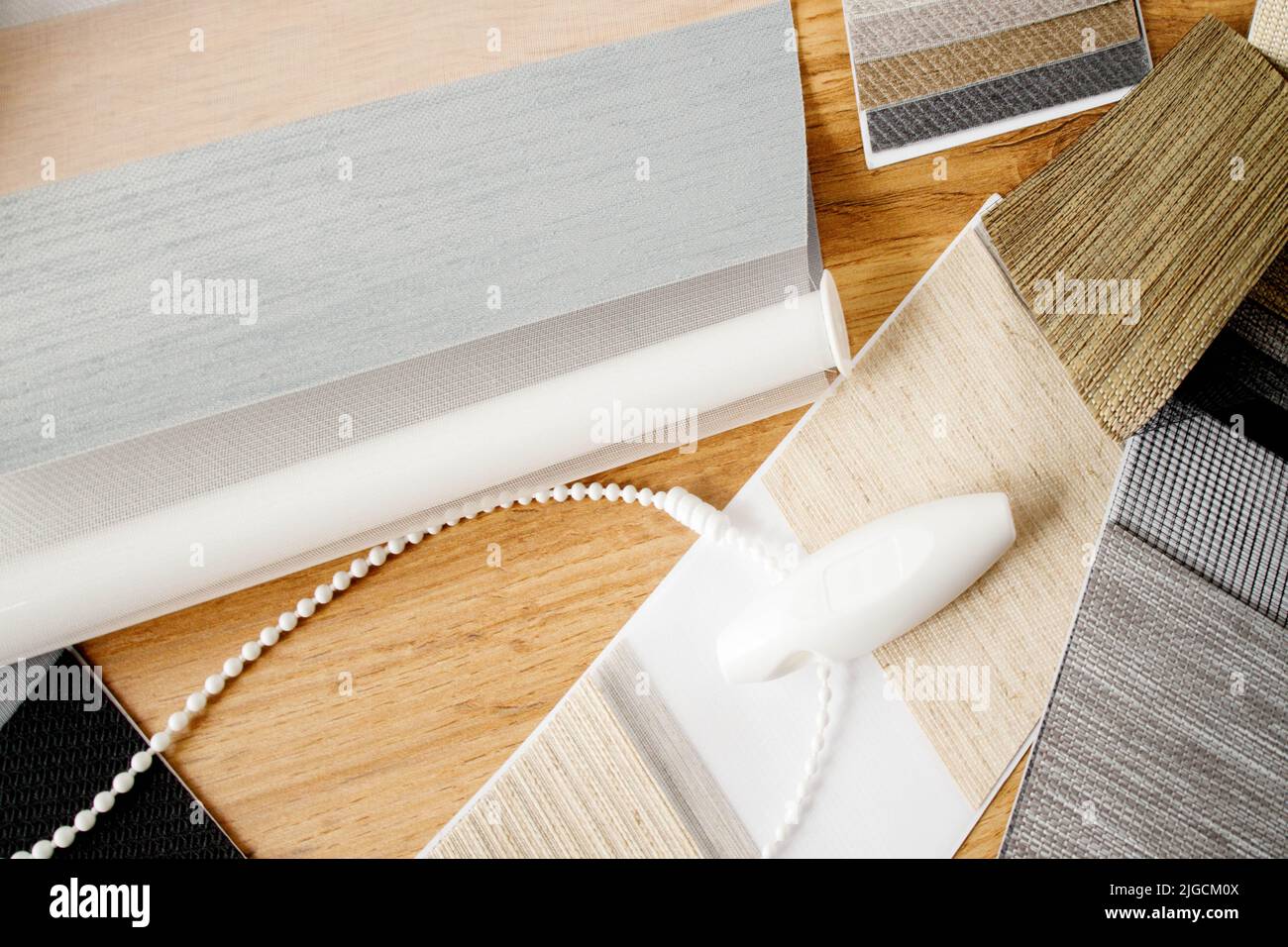 Samples of fabrics of different textures and colors in the form of a ...