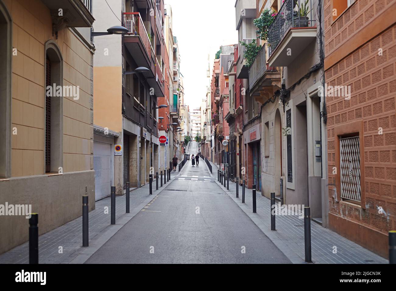 Typical small street in the city centre of Barcelona Stock Photo - Alamy