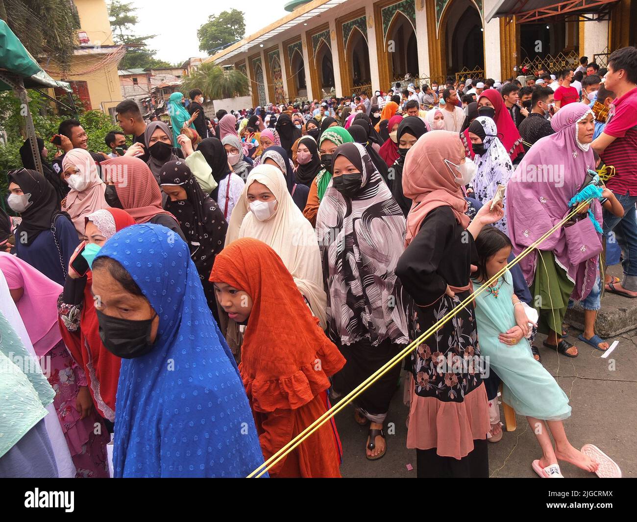 Manila, Philippines. 09th July, 2022. Muslim families leave the Golden ...