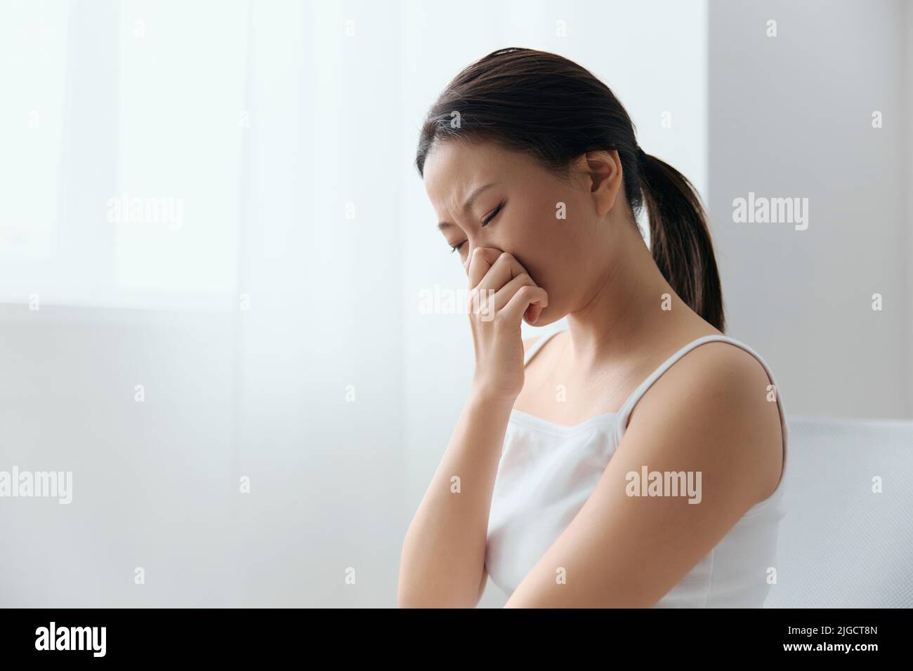 Rhinitis Sinusitis Flu. Suffering tormented tanned beautiful young ...