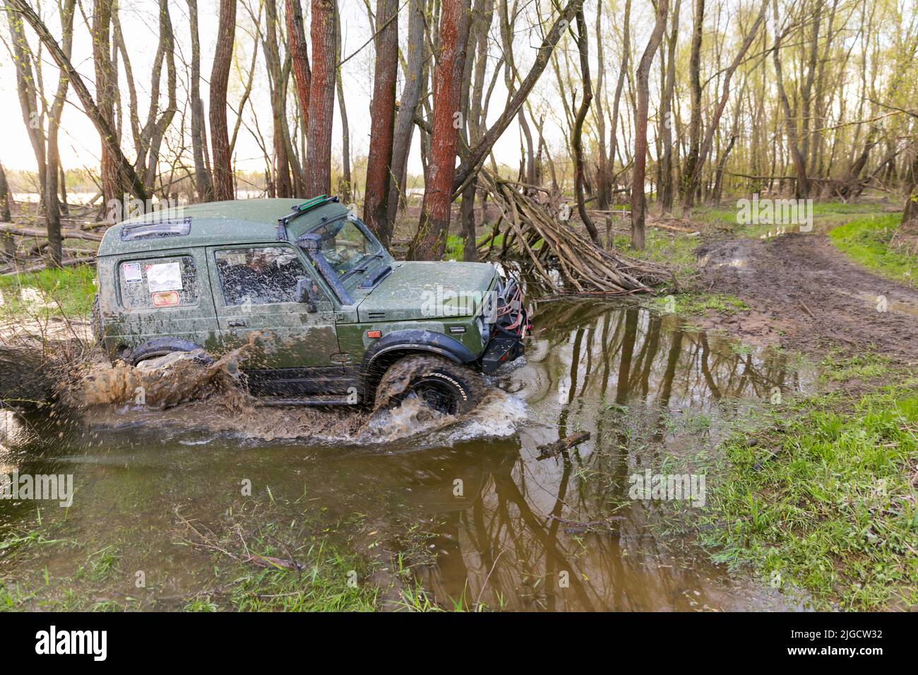 A 4WD car driving across the Vistula river basin. Poland, Europe Stock ...