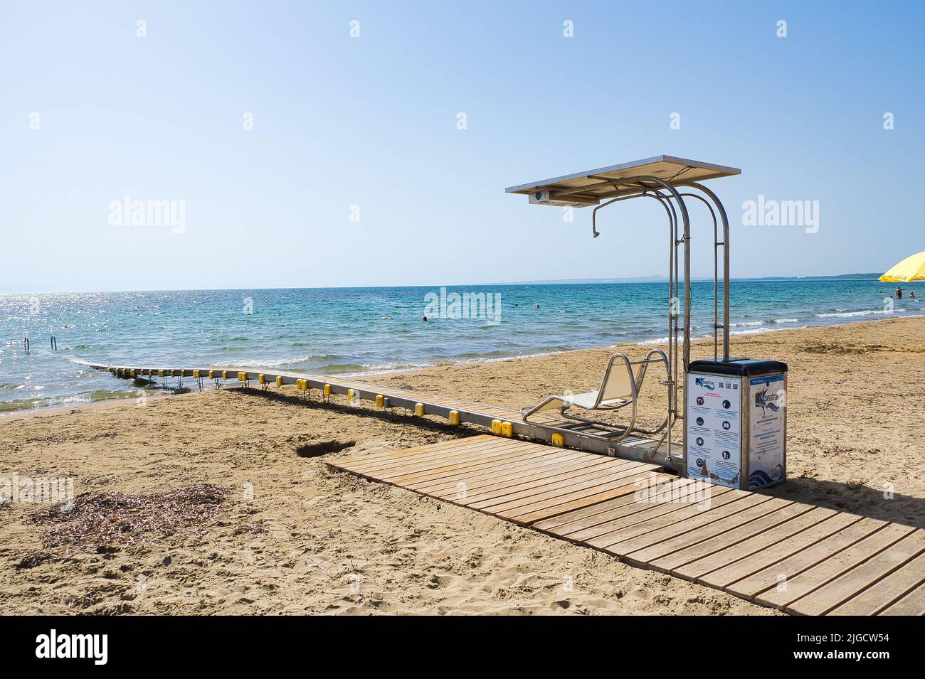 Beach wheelchair system allowing disabled people to access the sea ...