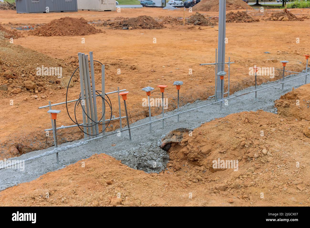 Providing reinforcement to a reinforced concrete structure through a ...