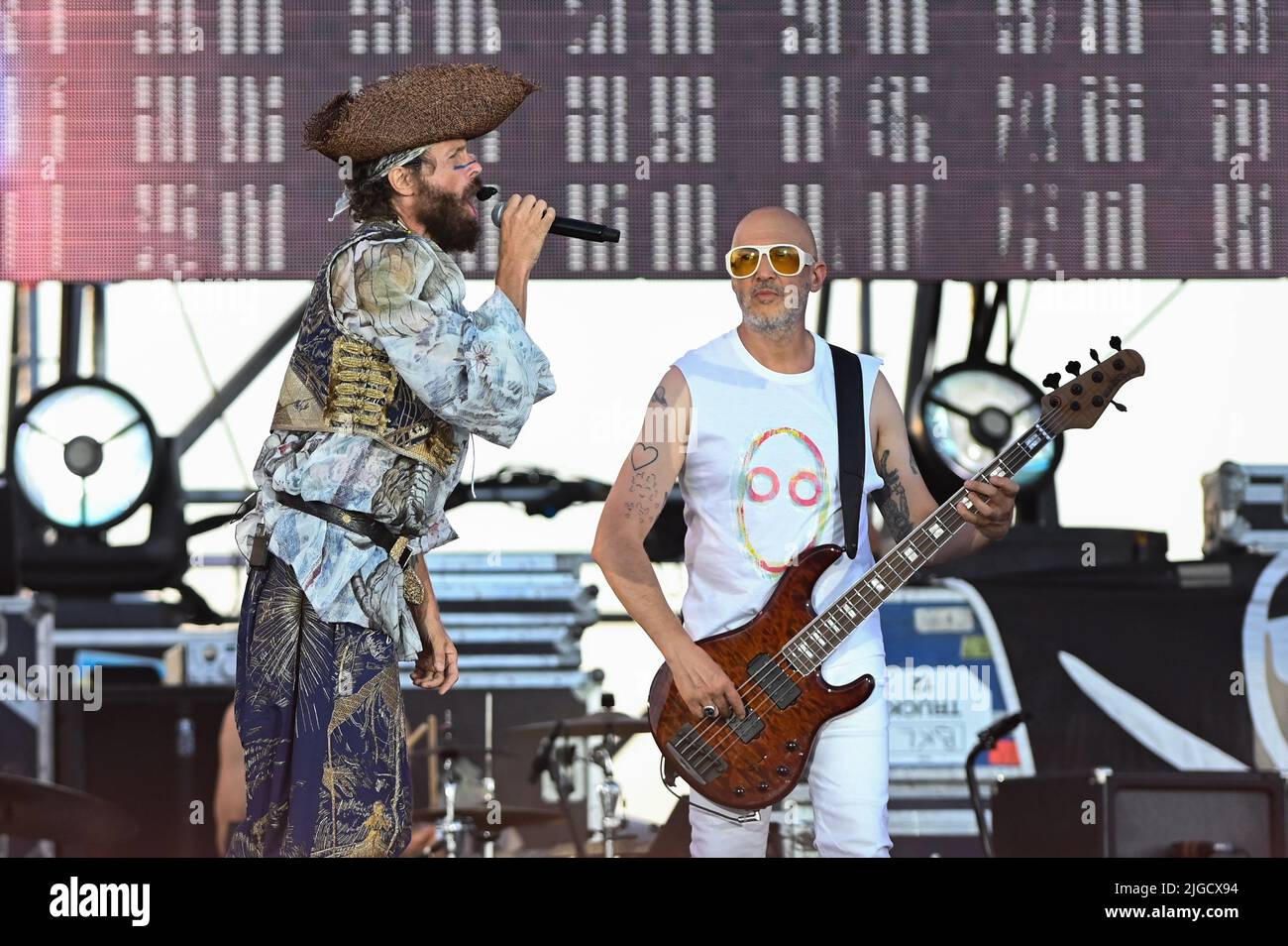 Jovanotti and Saturnino performing on stage during the Italian singer ...