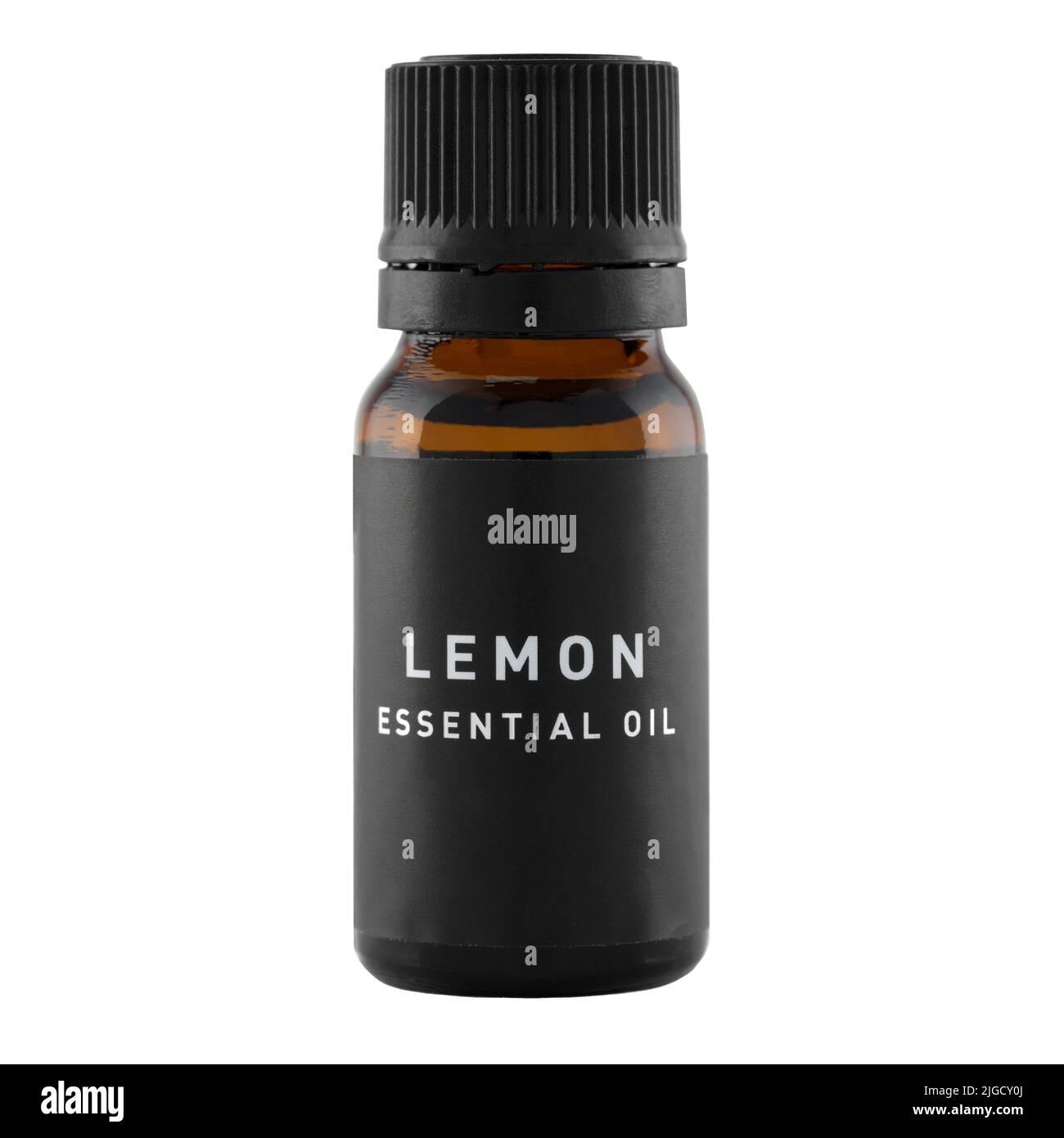 A bottle of lemon essential oil isolated on a white background. The ...