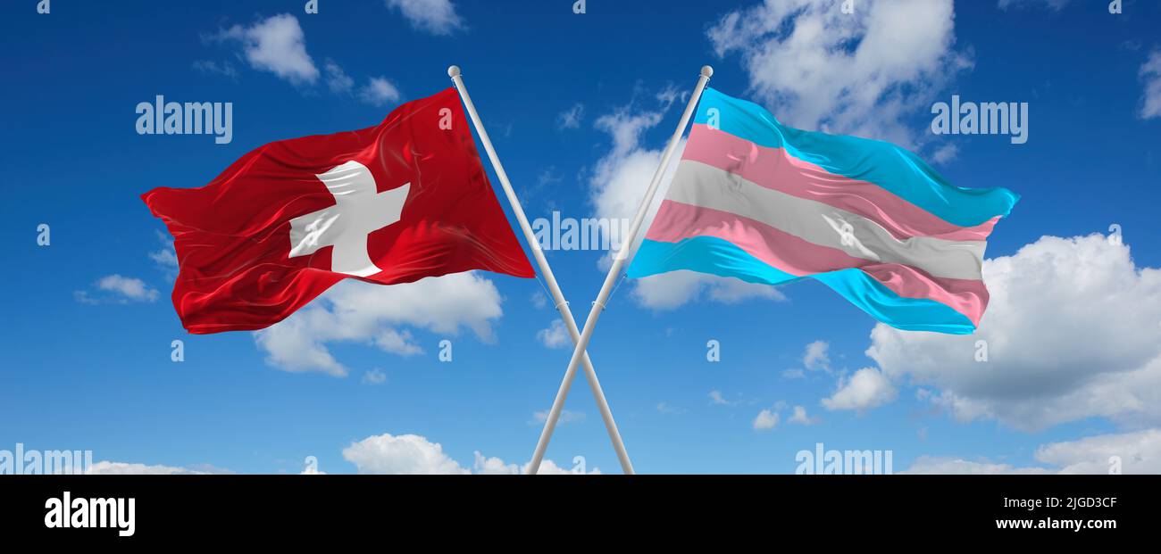 two crossed flags transgender Pride and Switzerland waving in wind at ...