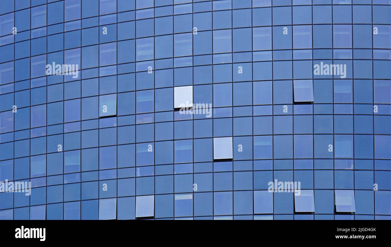 Modern blue windows facade at office building exterior Stock Photo - Alamy