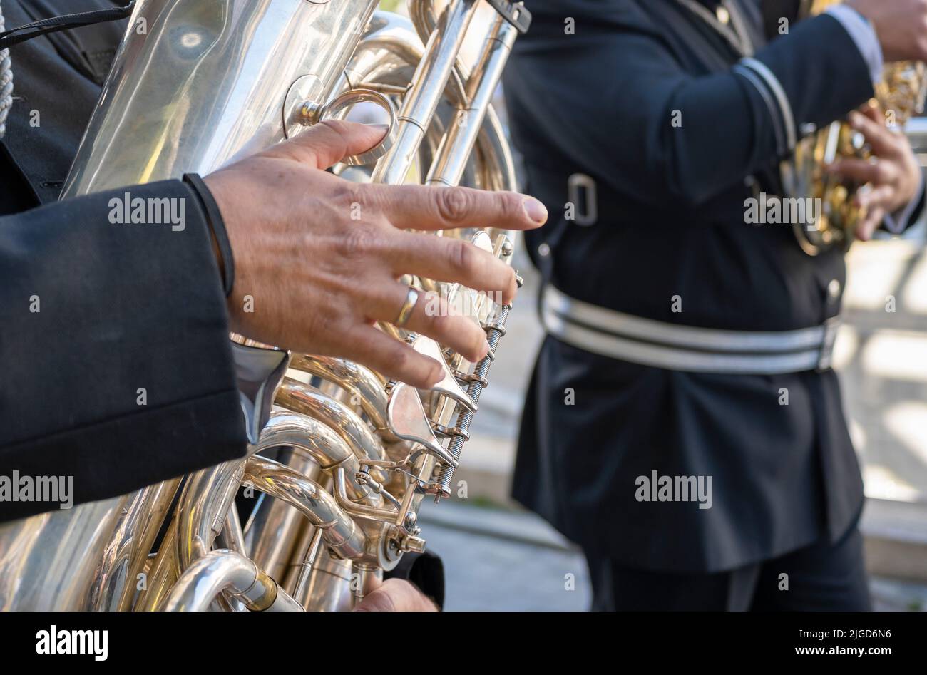 A musician playing tuba during one of the processions during the Holy ...
