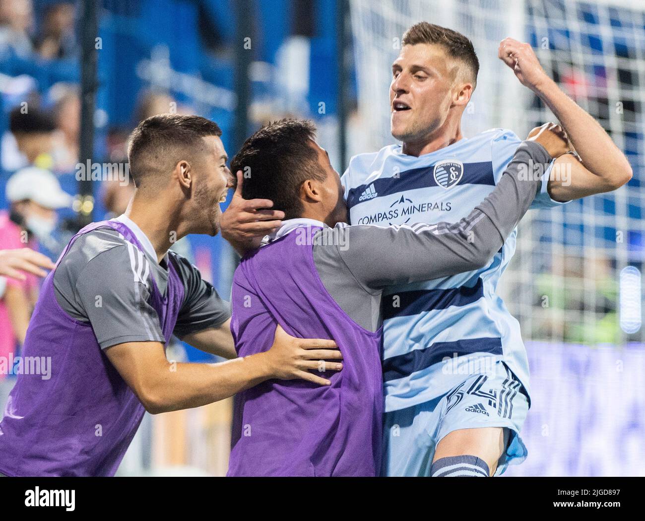 Sporting KC's Remi Walter (54) celebrates with teammates after scoring ...