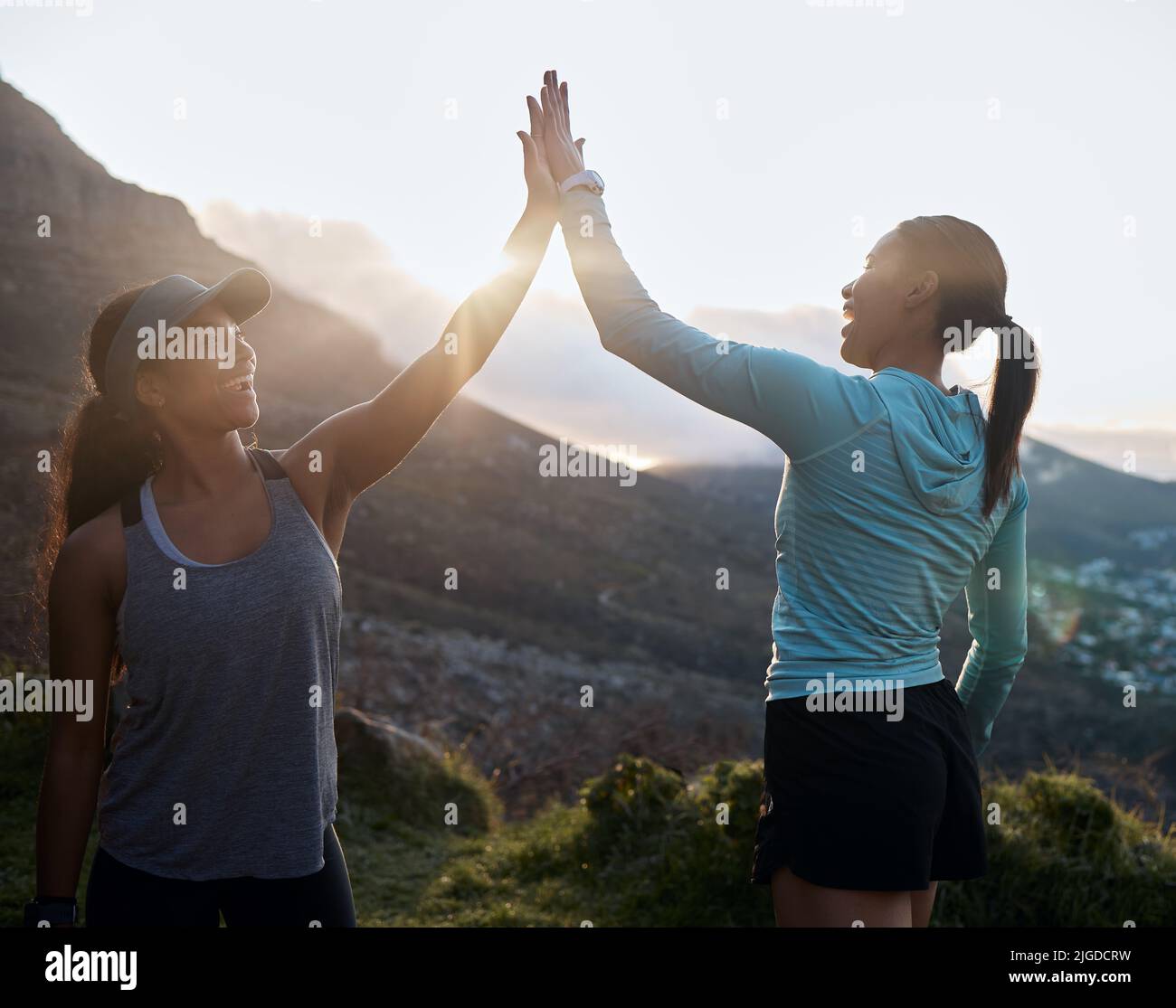 Two people high fiving after success hi-res stock photography and images - Alamy