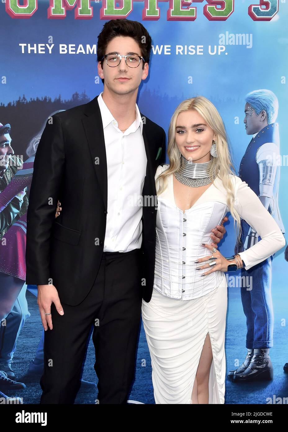 Milo Manheim and Meg Donnelly walking on the red carpet at the Disney+ ...