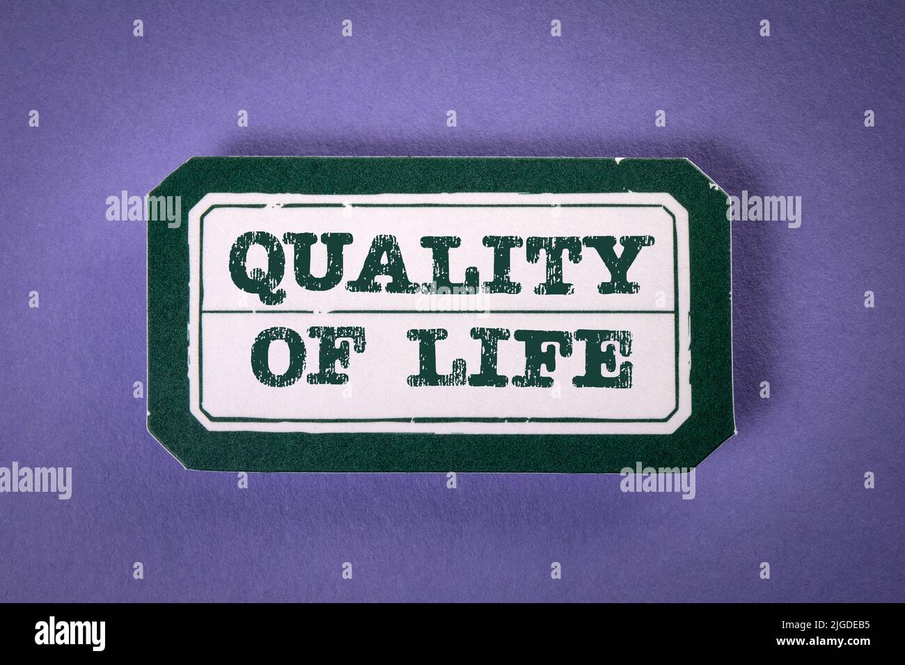 Quality of Life. Text on a decorative label sheet.Purple background ...