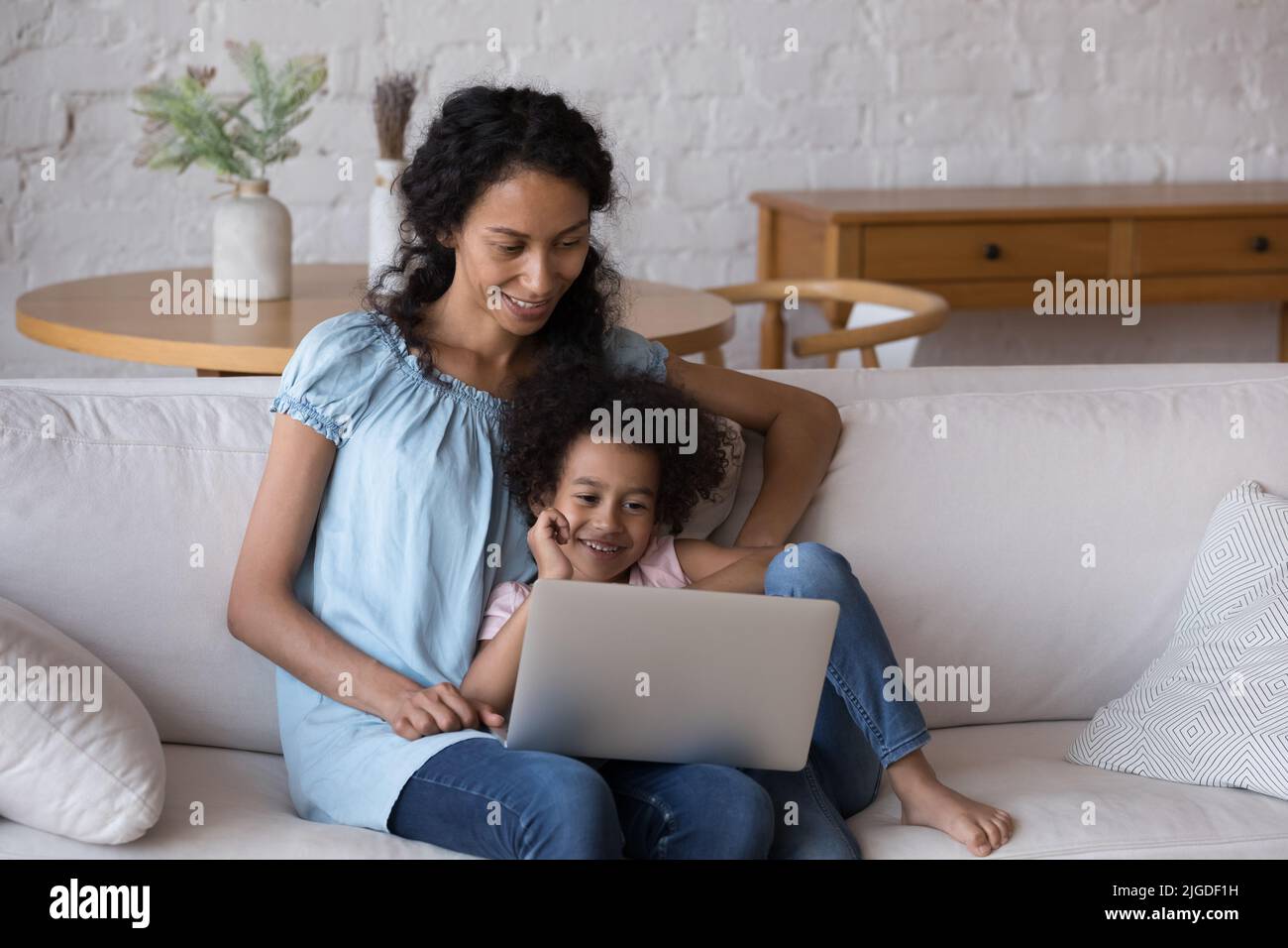 Watch movies on computer hi-res stock photography and images - Alamy