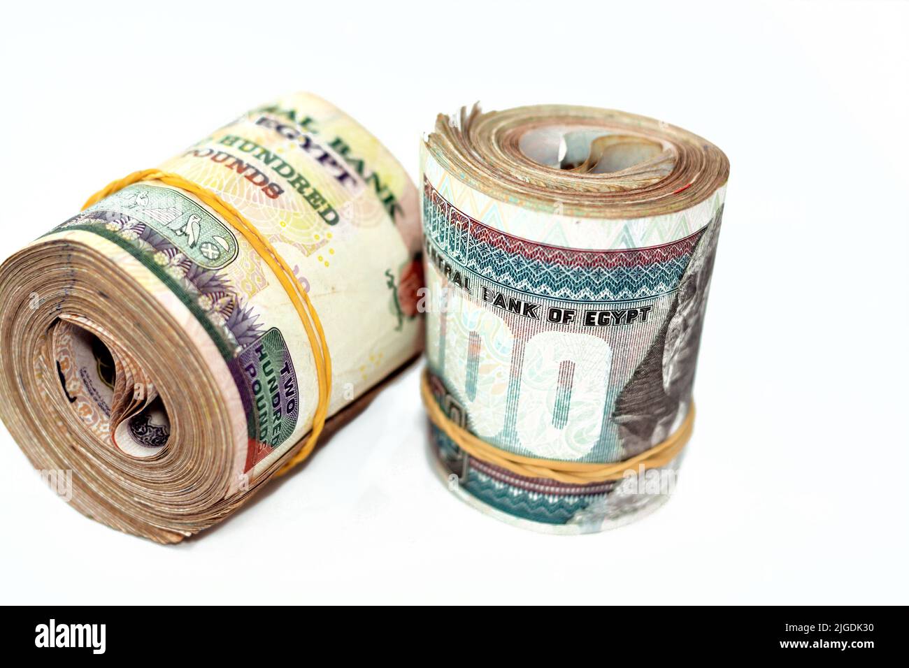 Egypt money roll pounds isolated on white background, 200 LE and 100 LE ...