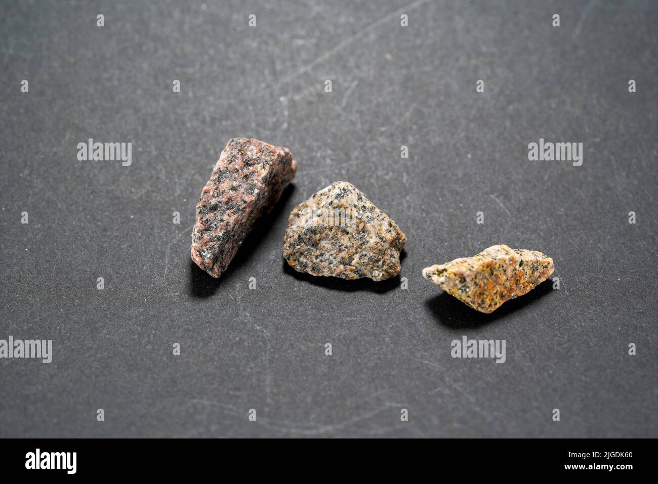 Granites are coarsely crystalline plutonic rocks rich in quartz and ...