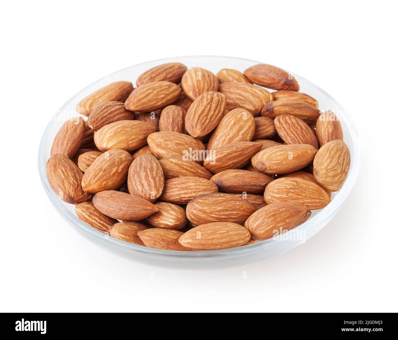 Almonds in glass plate isolated on white background Stock Photo - Alamy