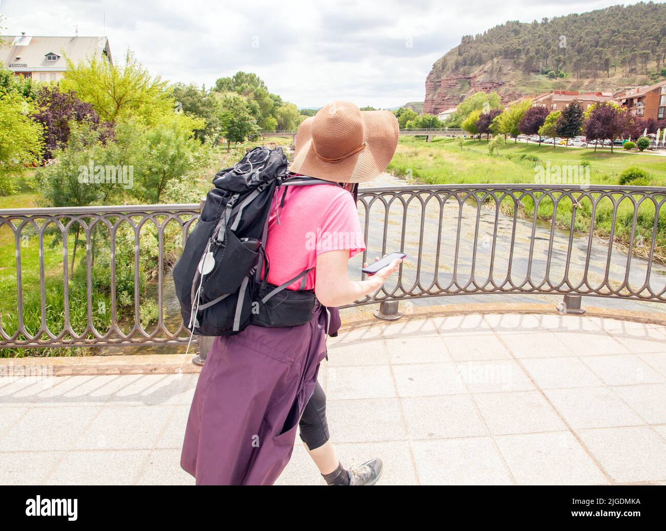 Pilgrims walking into Najera while walking the Camino de Santiago the ...
