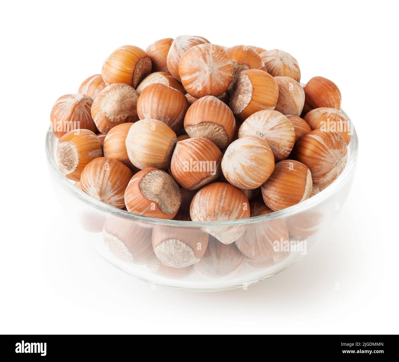 Hazelnuts in glass bowl isolated on white background with clipping path ...