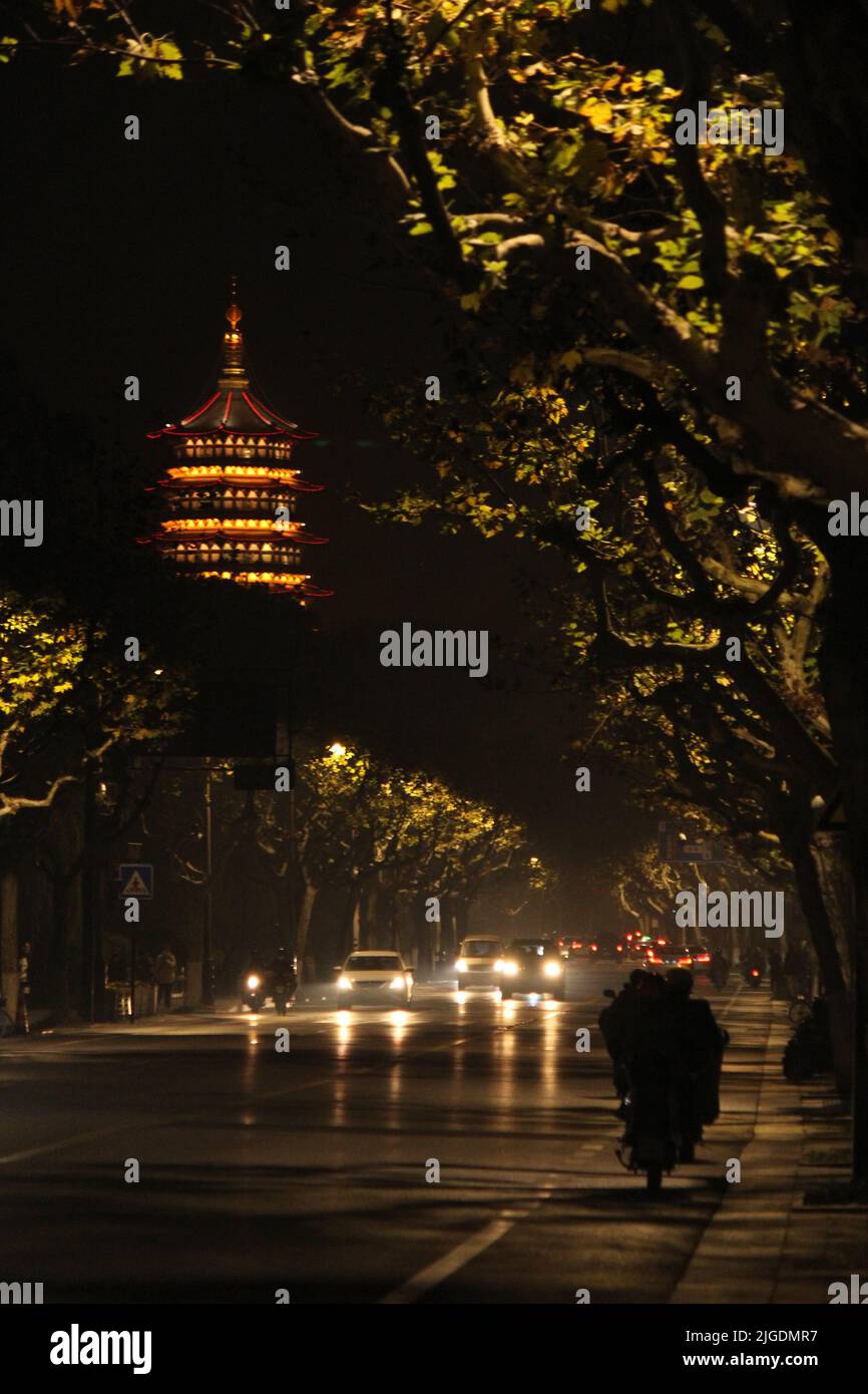A vertical distant view of Leifeng Pagoda tower in the evening in ...