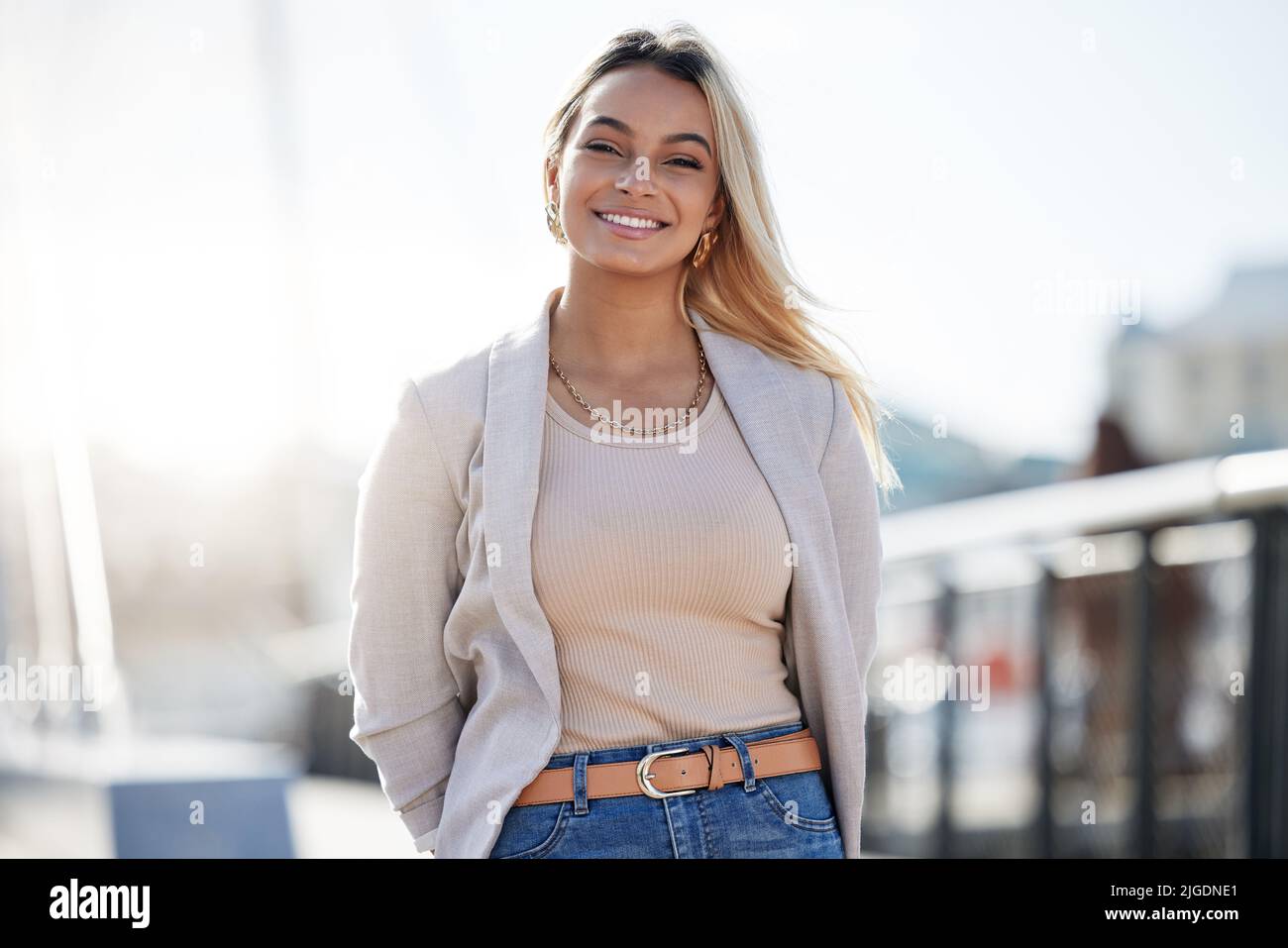 Life is to be lived. a young woman spending time outside Stock Photo ...
