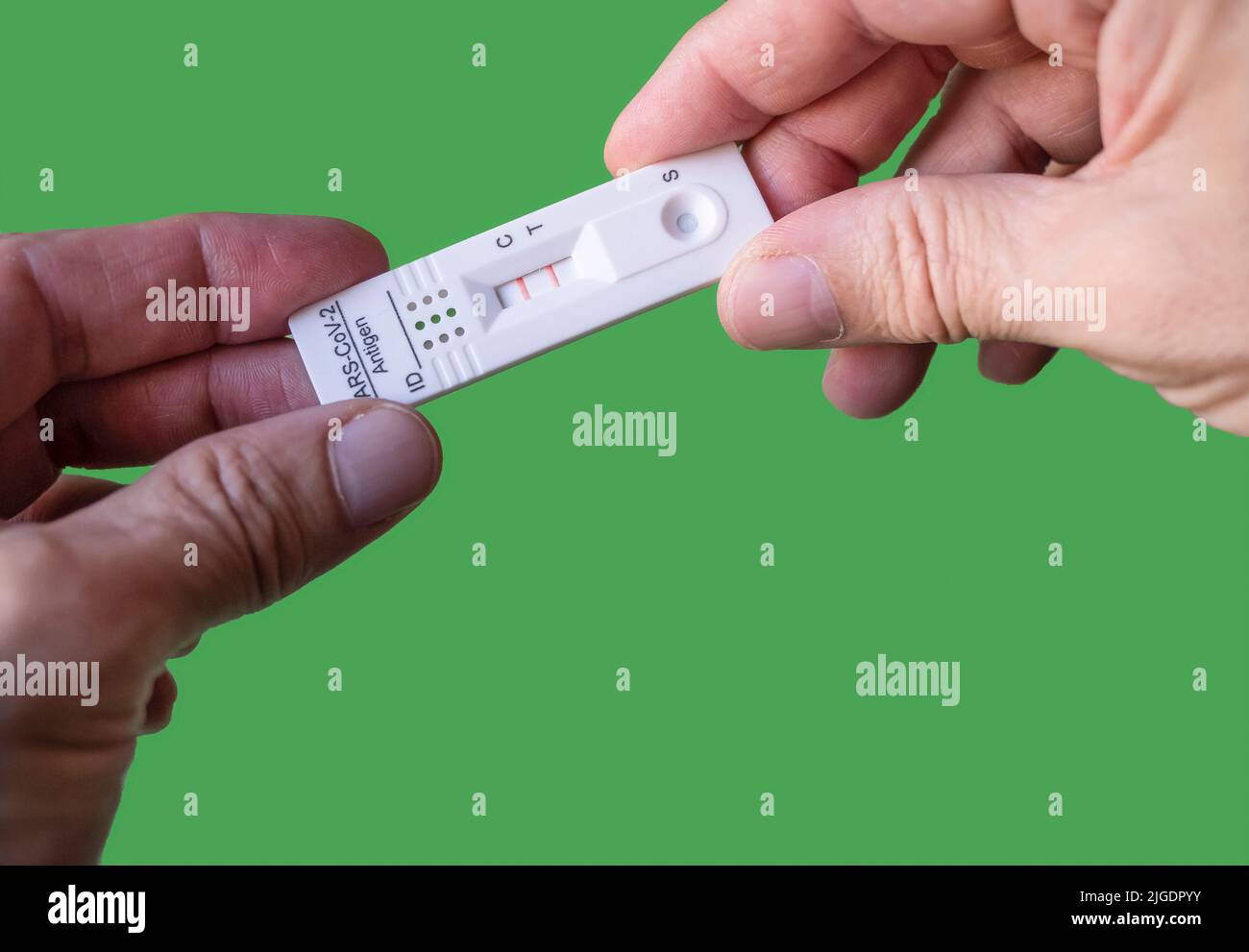Own hand showing negative Covid-19 test result with SARS CoV-2 rapid ...