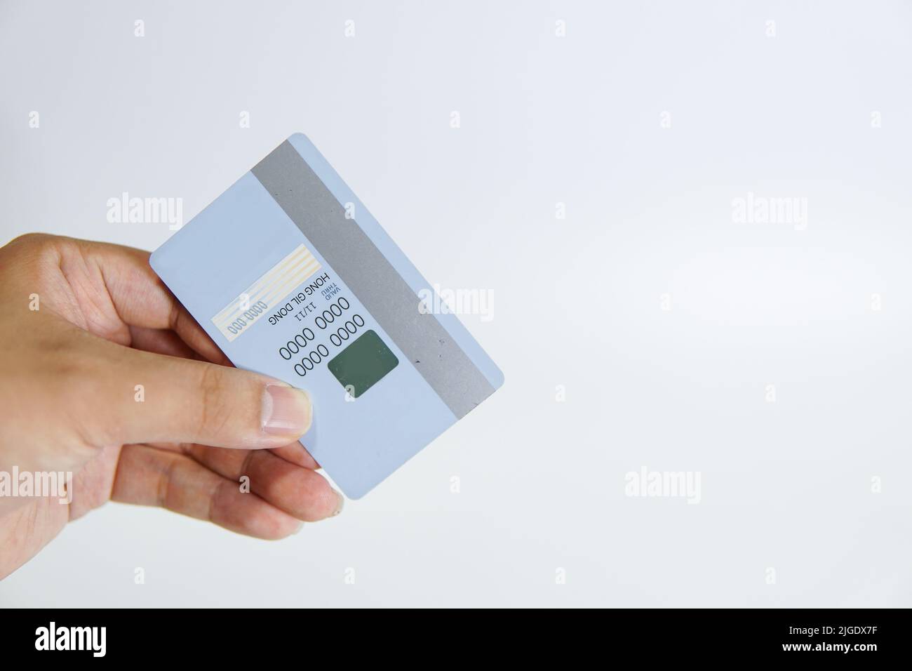 Hand holding a credit card hi-res stock photography and images - Alamy