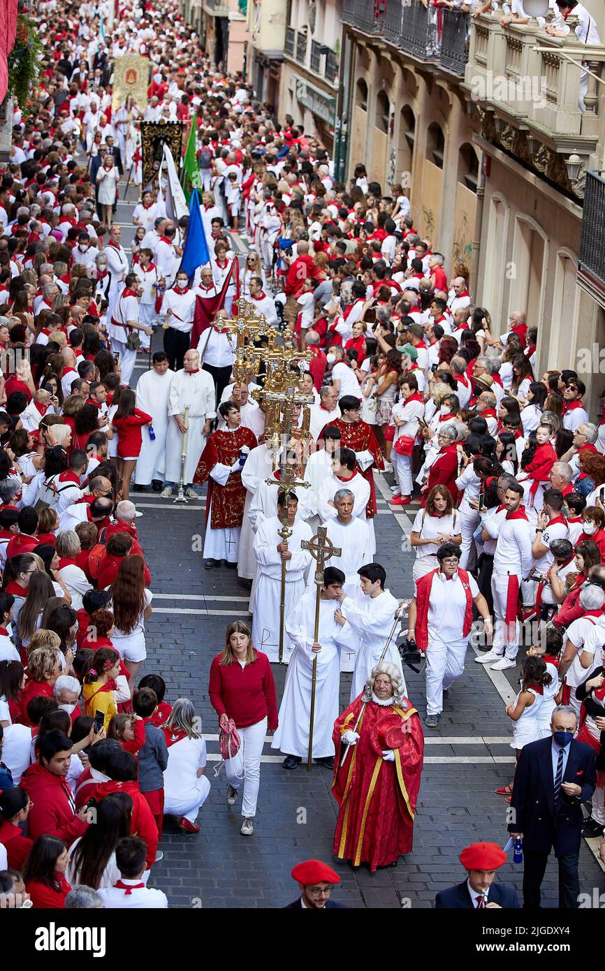 People attend the San Fermin procession during the traditional San ...