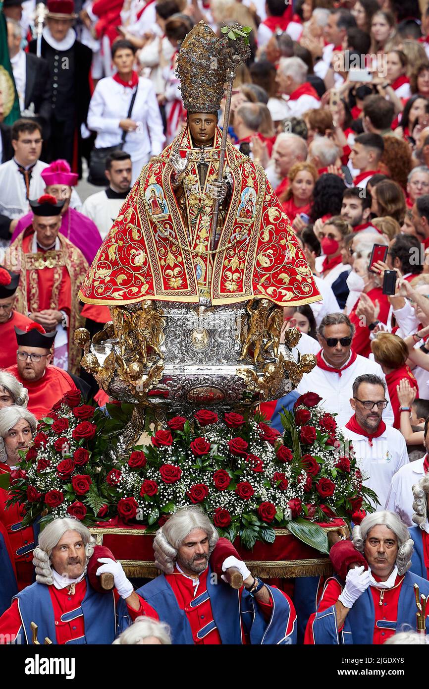 People attend the San Fermin procession during the traditional San ...