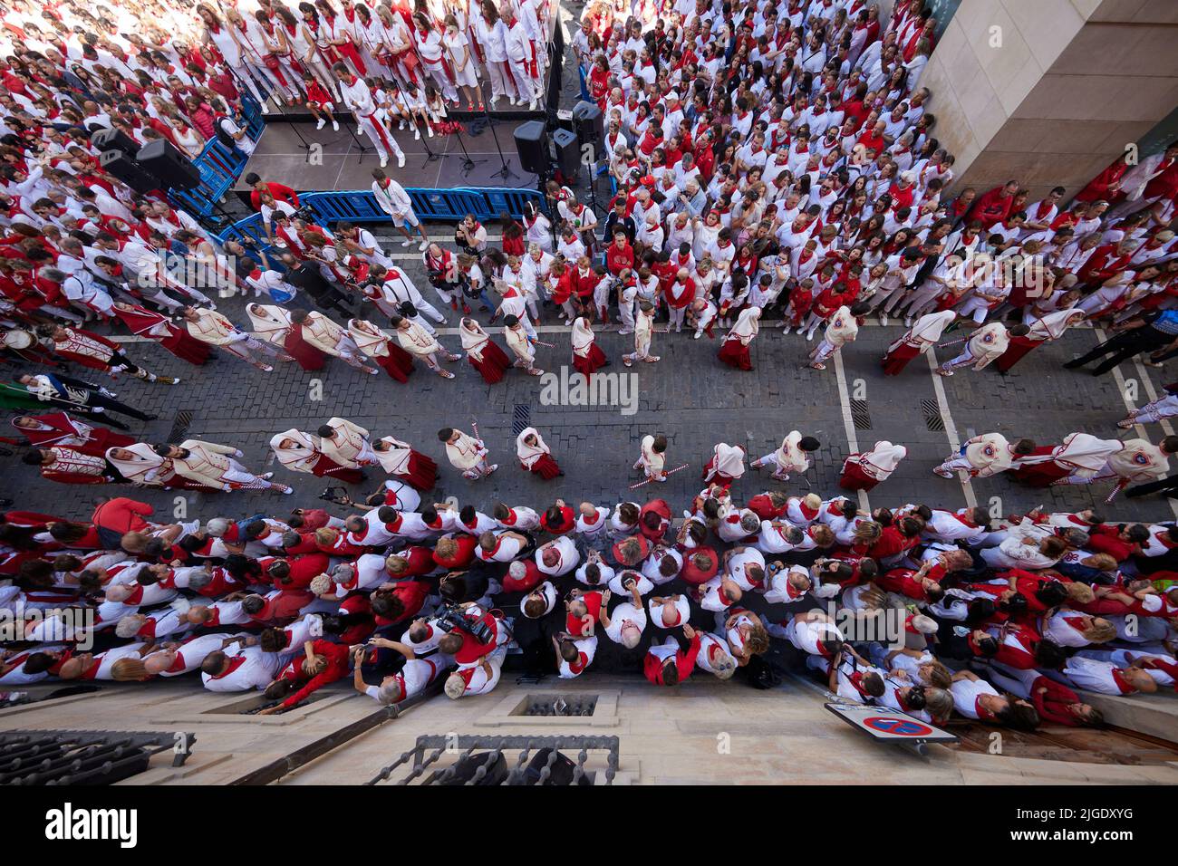 People attend the San Fermin procession during the traditional San ...