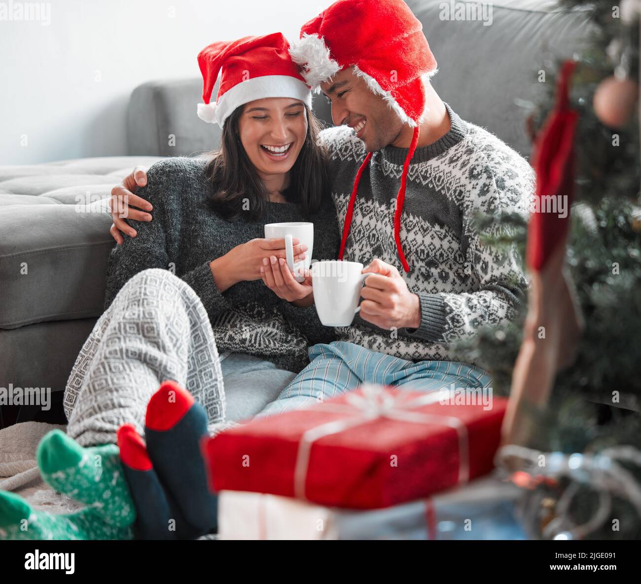 Nothing can break our bond. a young couple drinking coffee while ...
