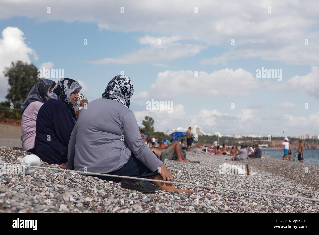 Group of Turkish women resting on the beach of Antalya, Turkey Stock ...