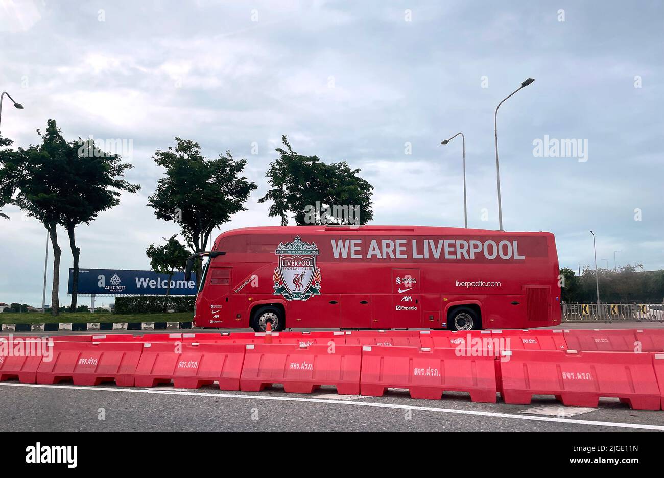 The Liverpool team bus leaves Suvarnabhumi Airport after they arrive in ...